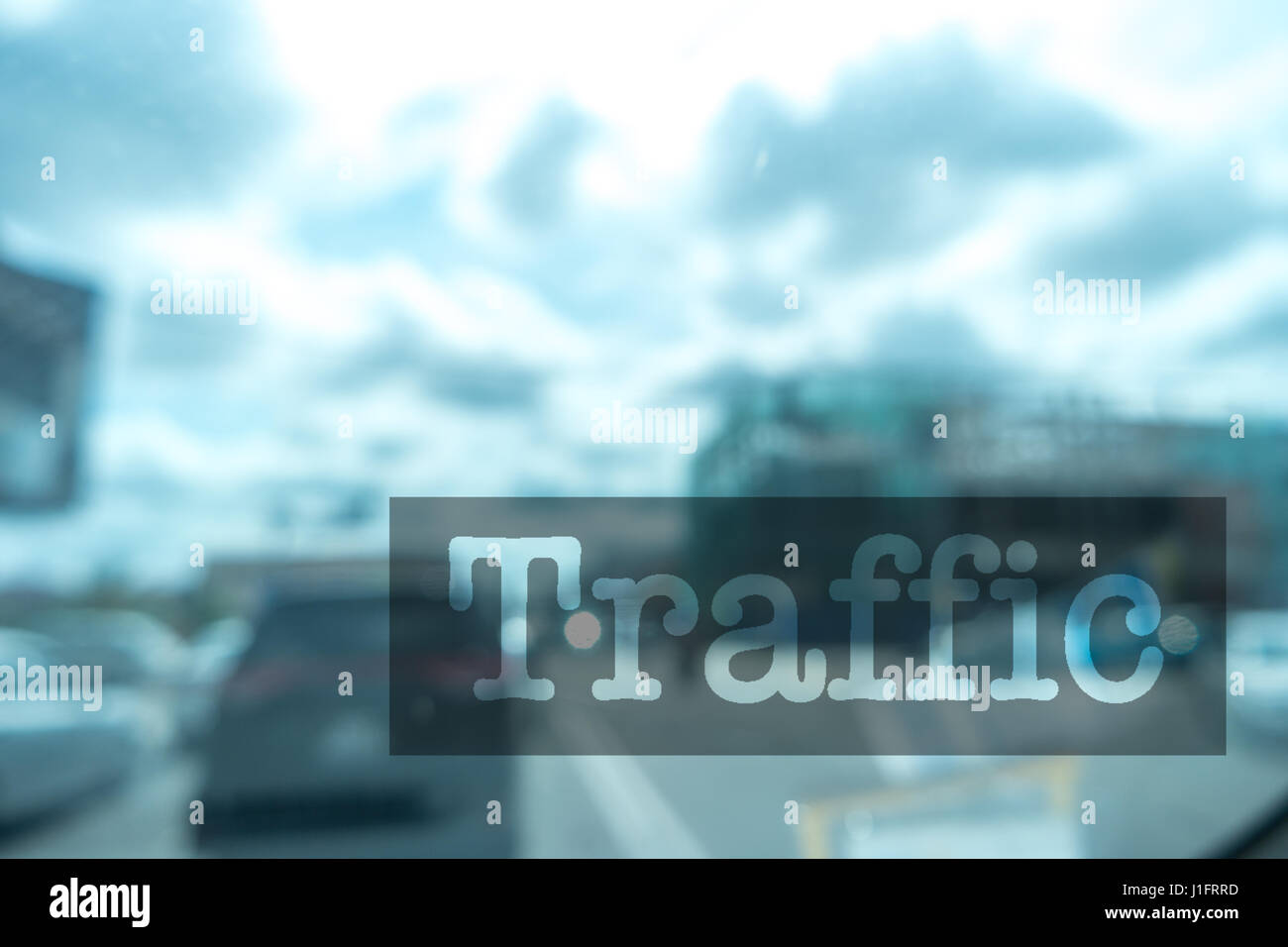 Traffic text with blurred background Stock Photo - Alamy