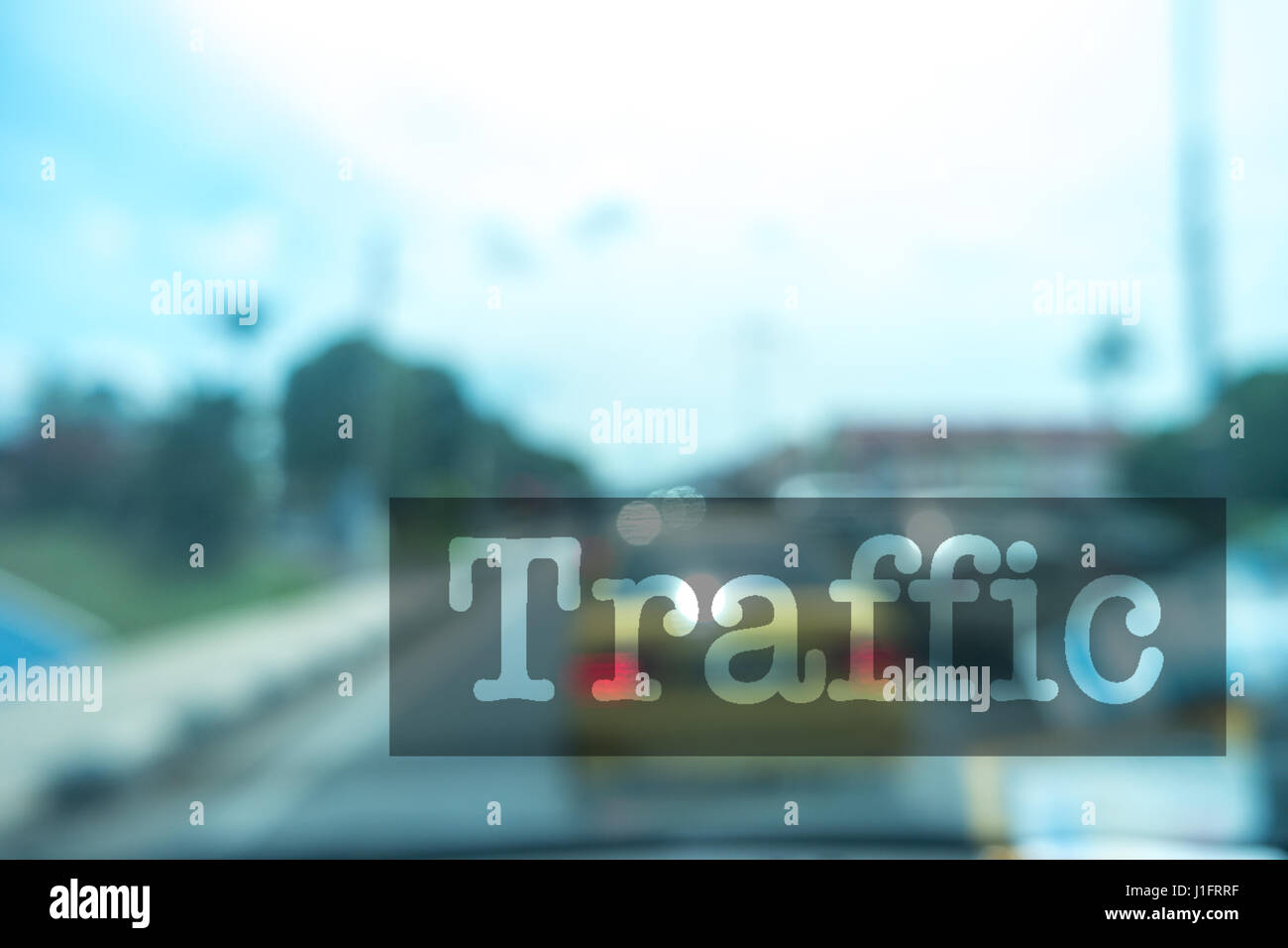 Traffic text with blurred background Stock Photo - Alamy