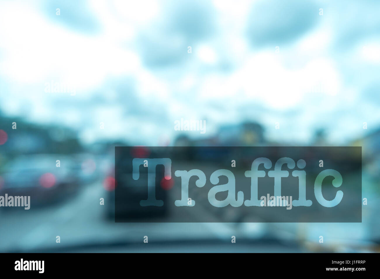 Traffic text with blurred background Stock Photo - Alamy