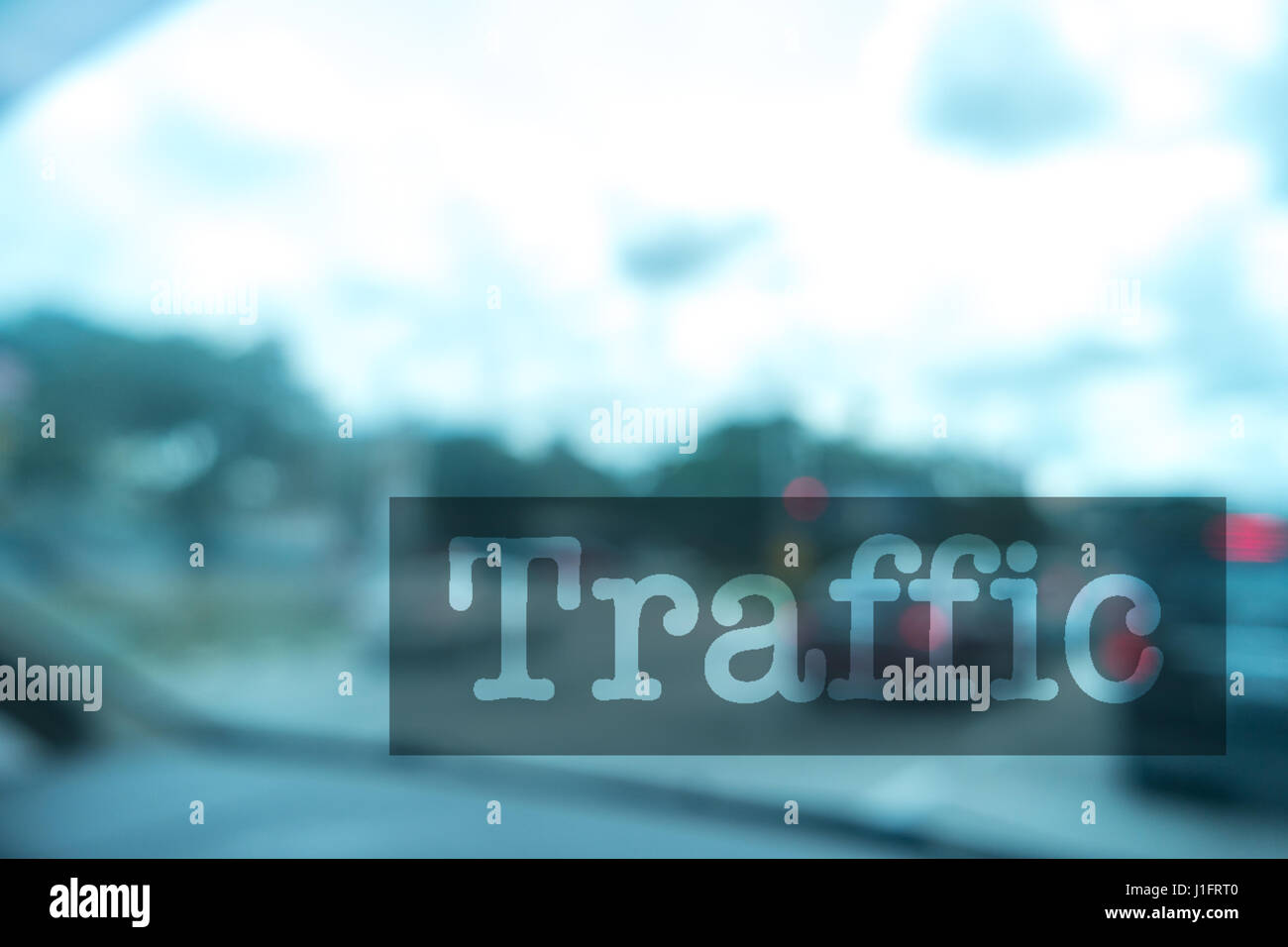 Traffic text with blurred background Stock Photo - Alamy
