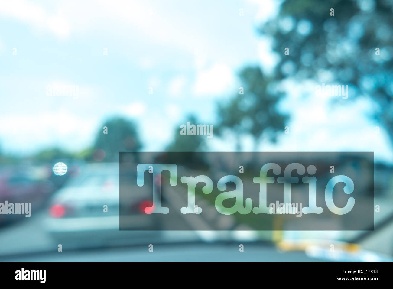 Traffic text with blurred background Stock Photo - Alamy