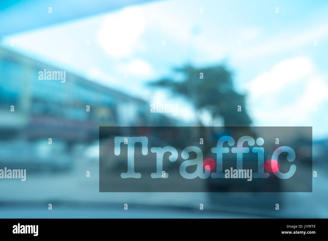Traffic text with blurred background Stock Photo - Alamy