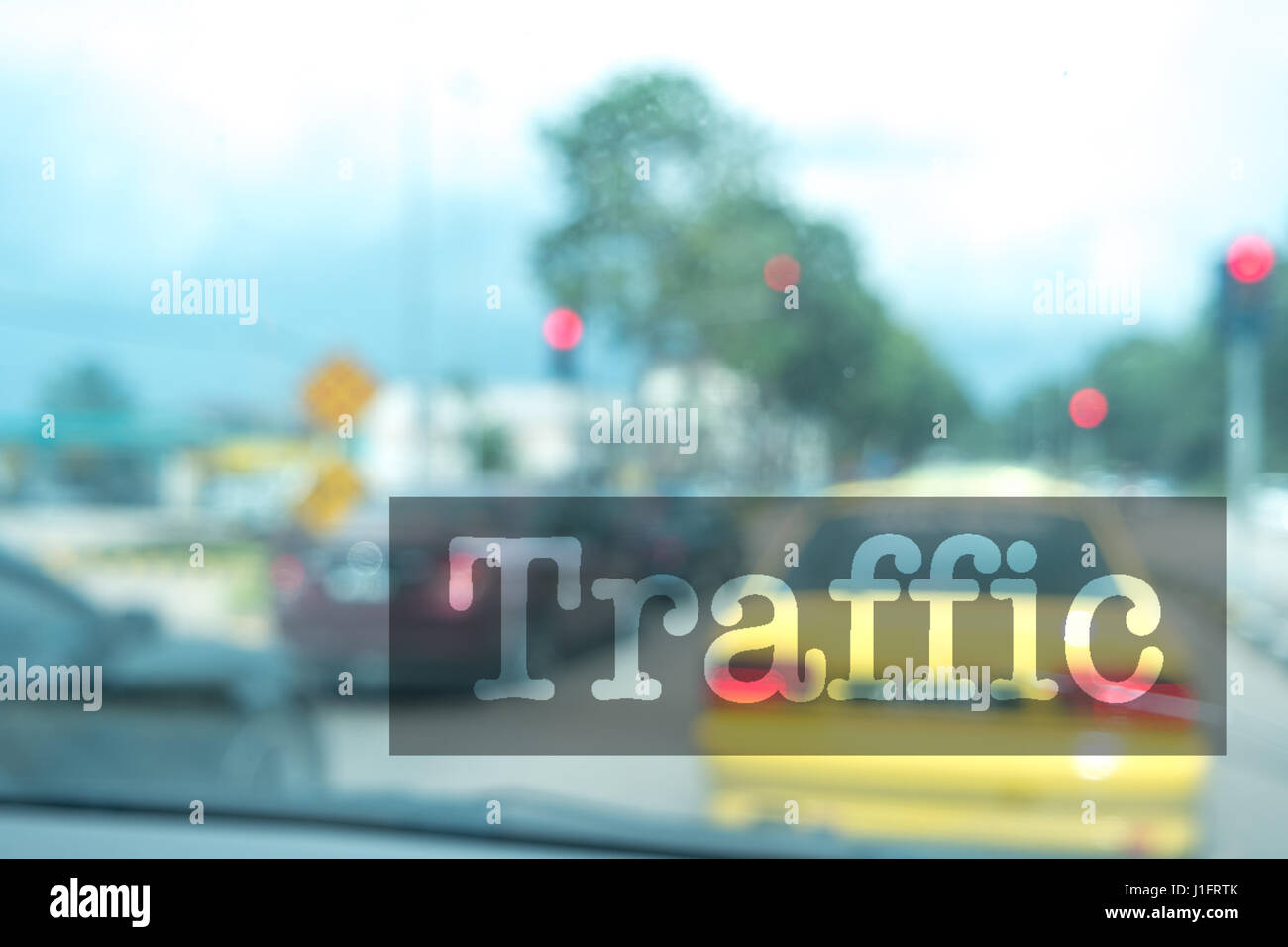 Traffic text with blurred background Stock Photo - Alamy