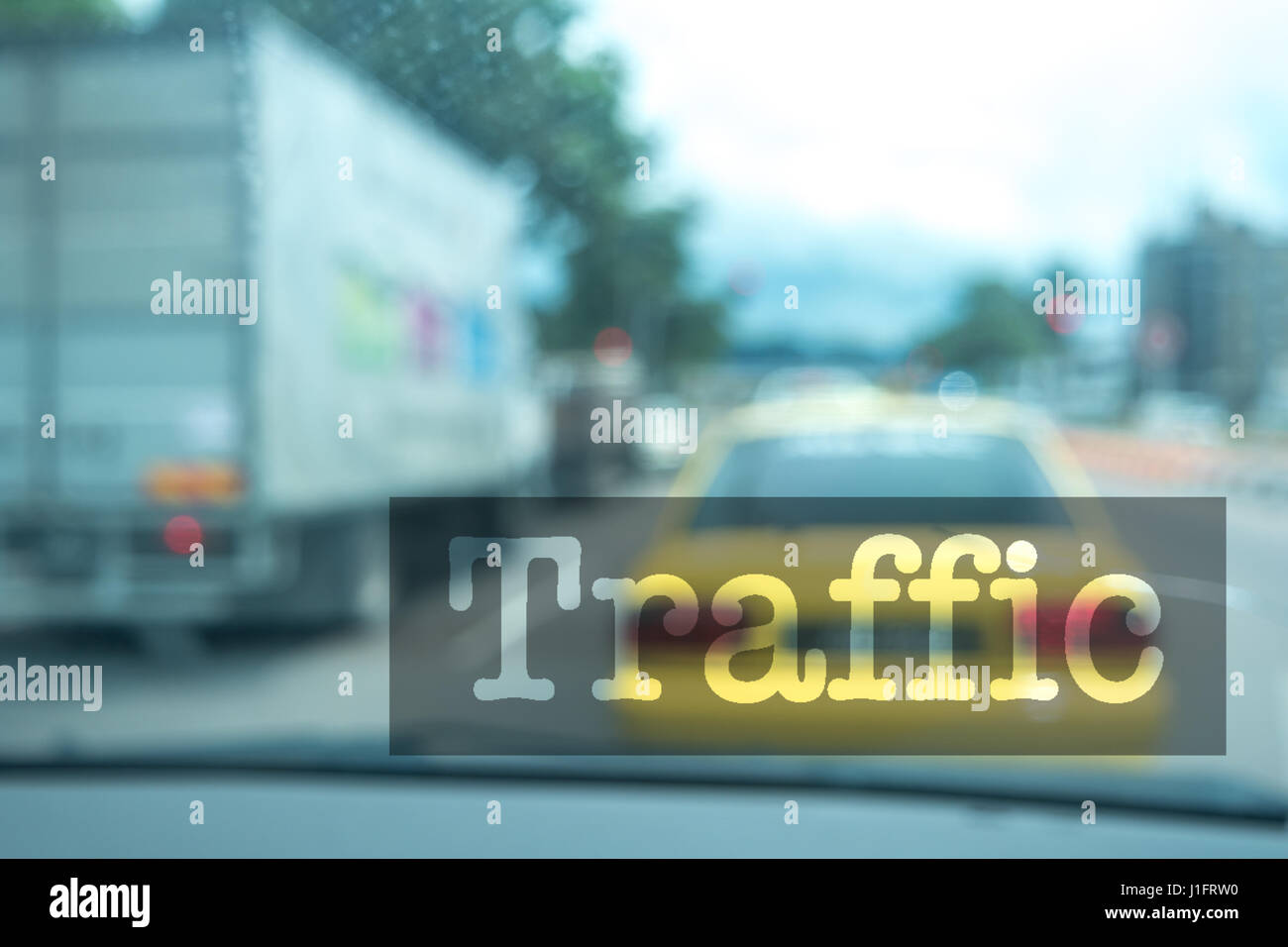 Traffic text with blurred background Stock Photo - Alamy