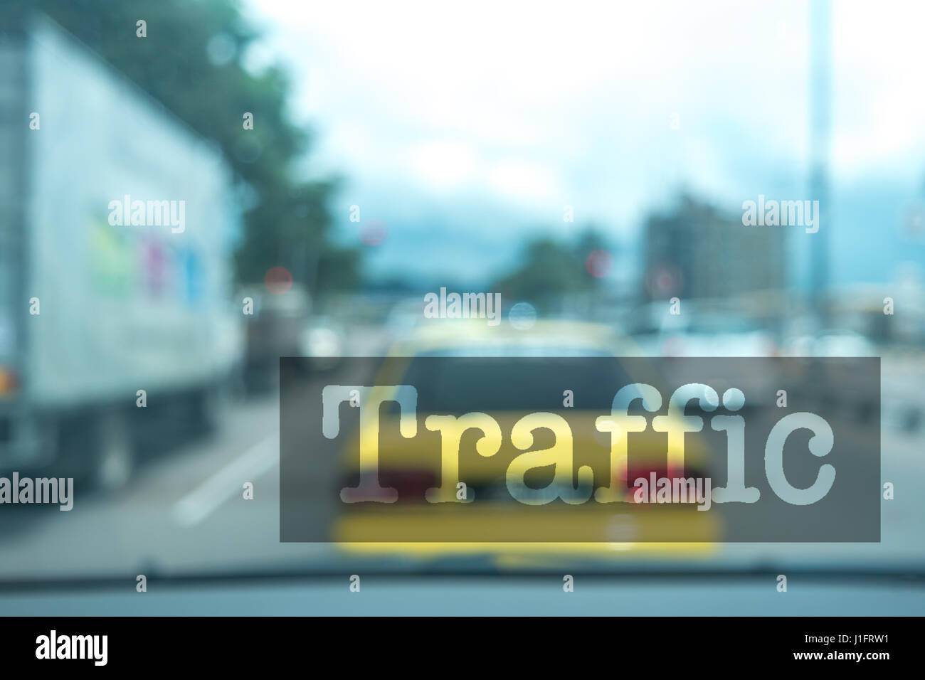 Traffic text with blurred background Stock Photo - Alamy