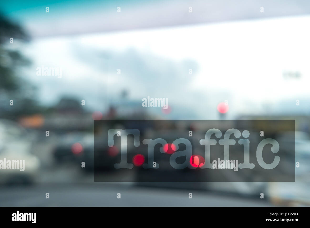Traffic text with blurred background Stock Photo - Alamy