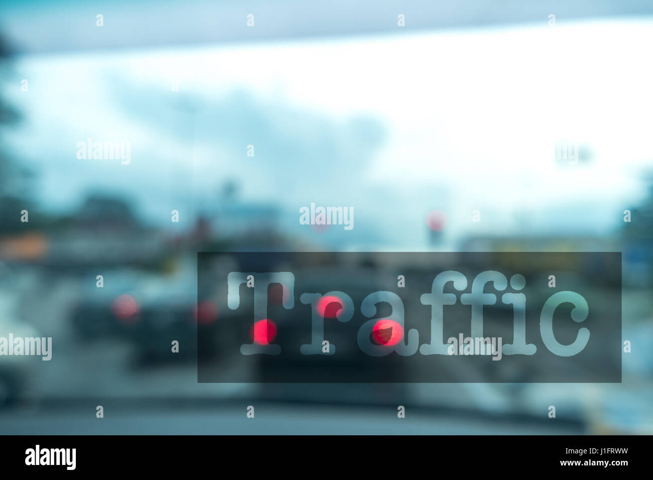 Traffic text with blurred background Stock Photo - Alamy