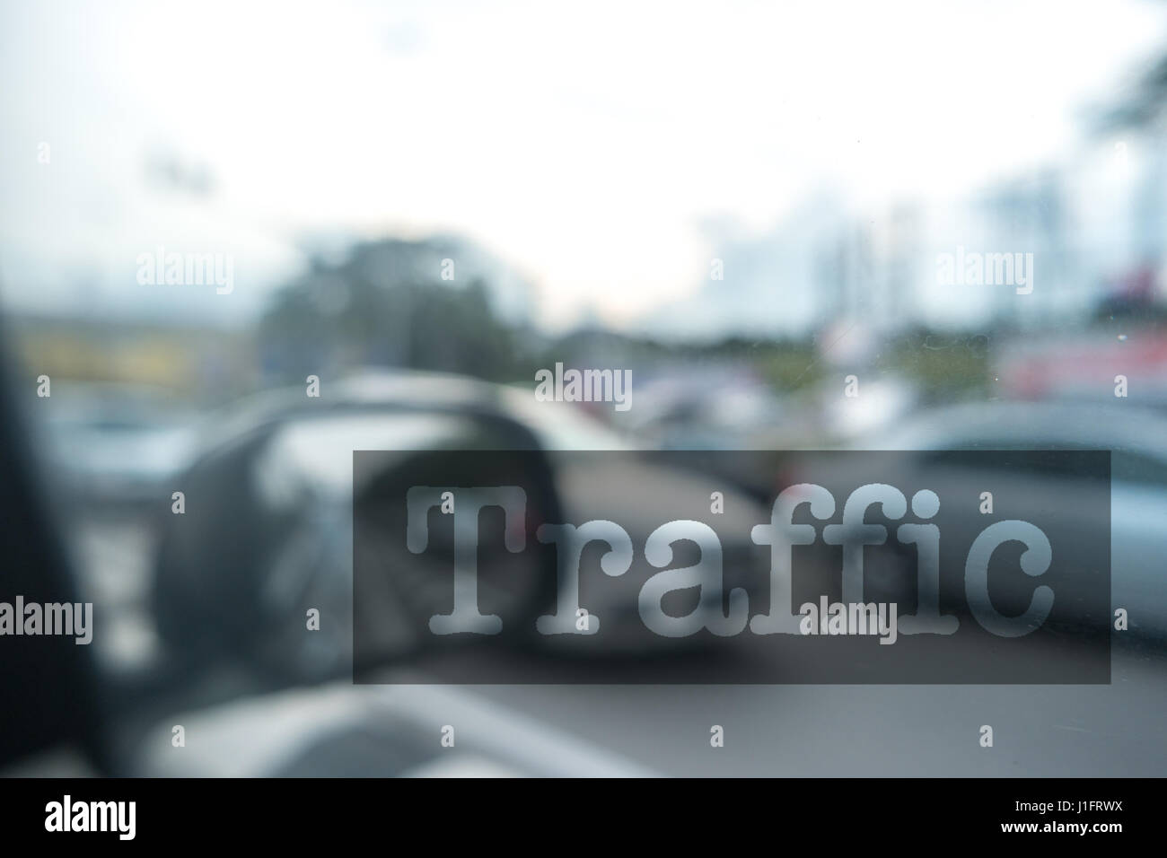 Traffic text with blurred background Stock Photo - Alamy