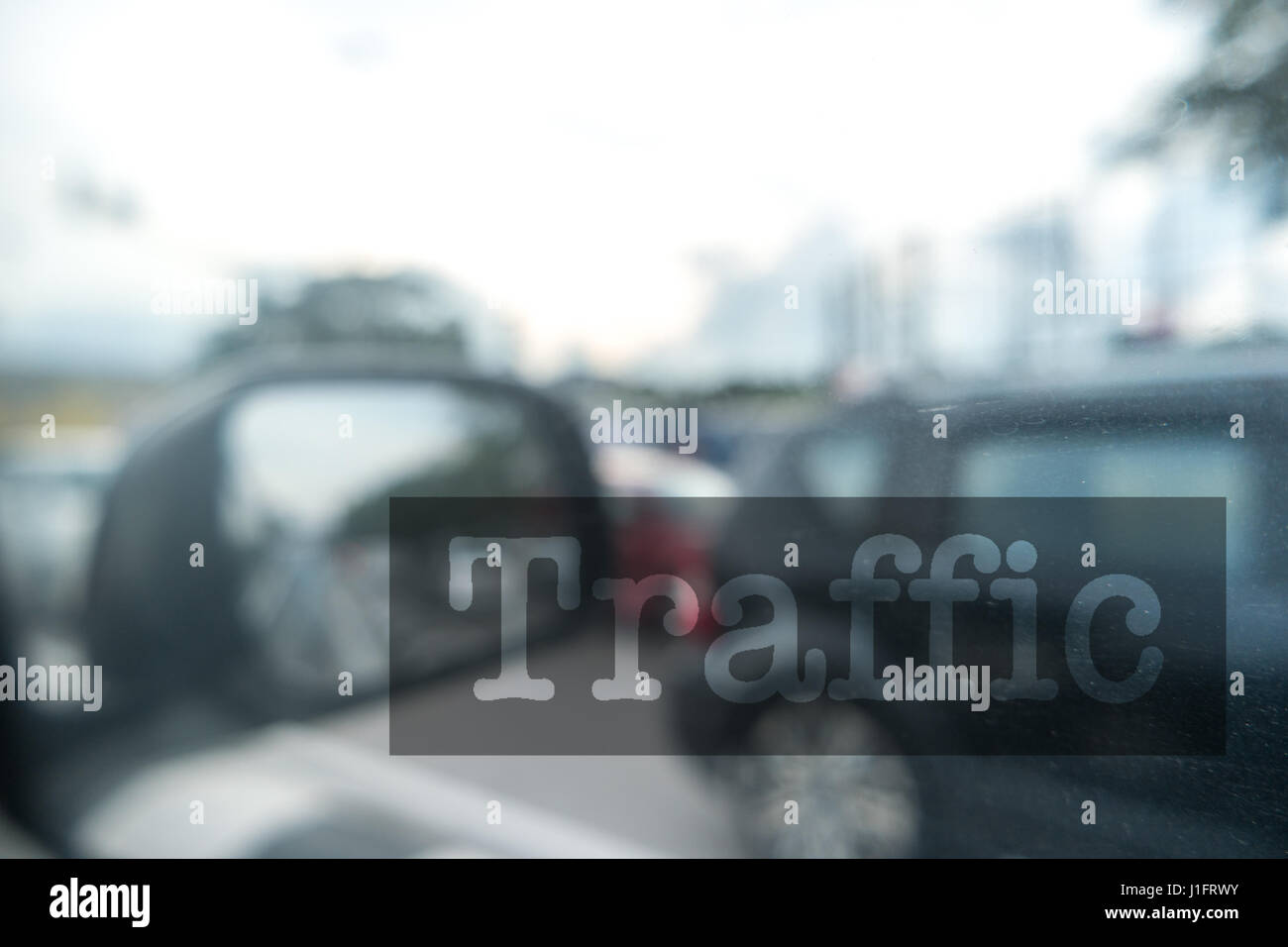 Traffic text with blurred background Stock Photo - Alamy