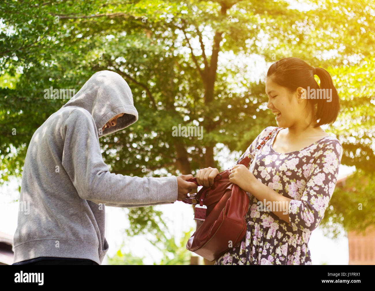 Purse snatch hi-res stock photography and images - Alamy