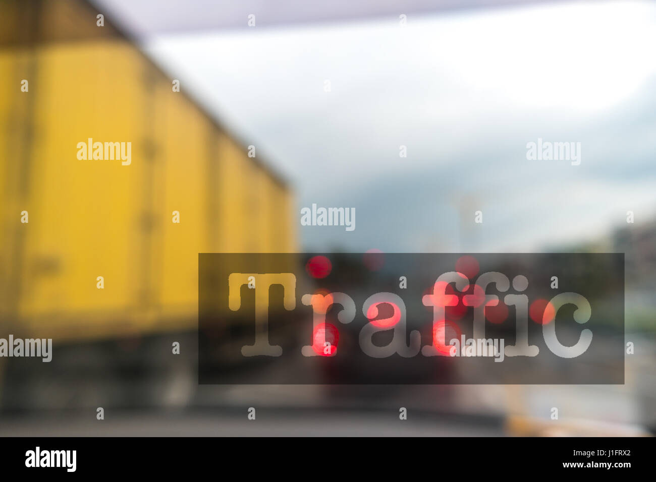 Traffic text with blurred background Stock Photo - Alamy