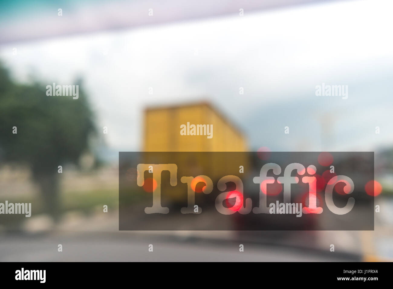 Traffic text with blurred background Stock Photo - Alamy