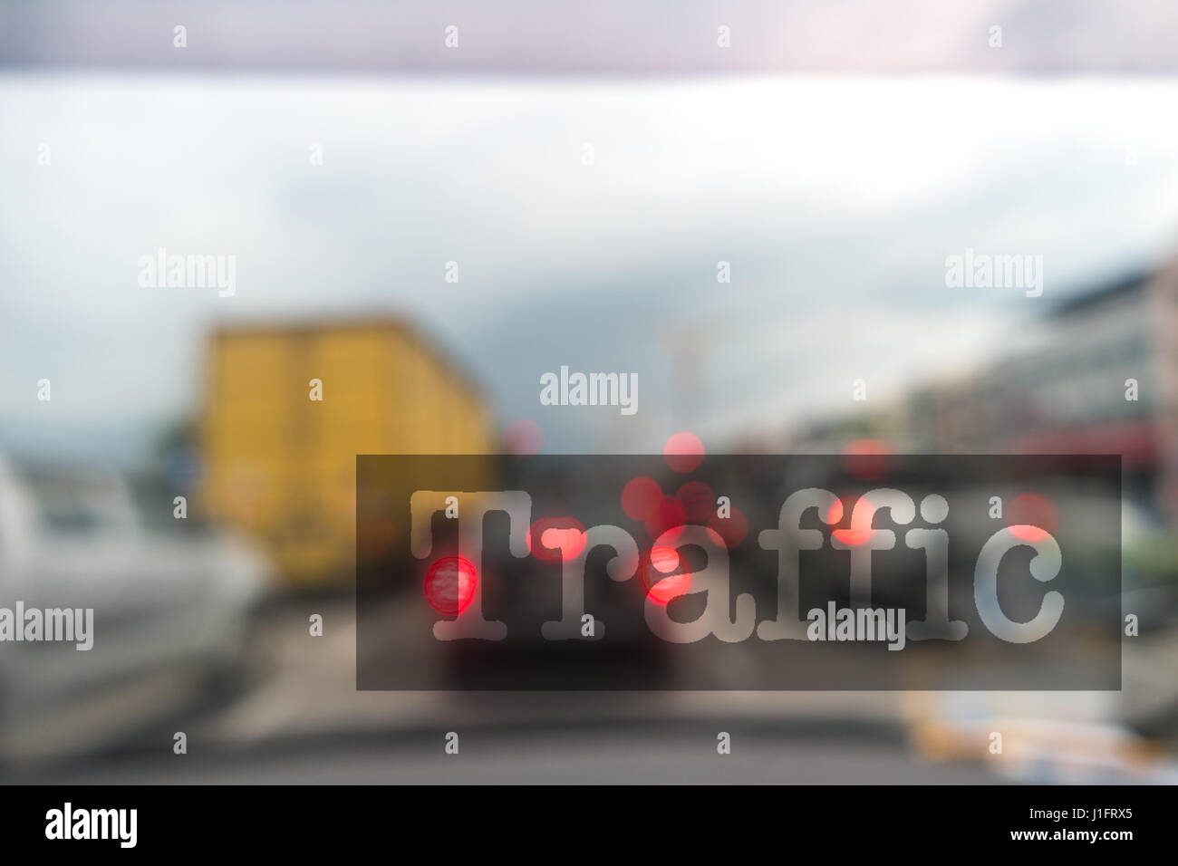 Traffic text with blurred background Stock Photo - Alamy