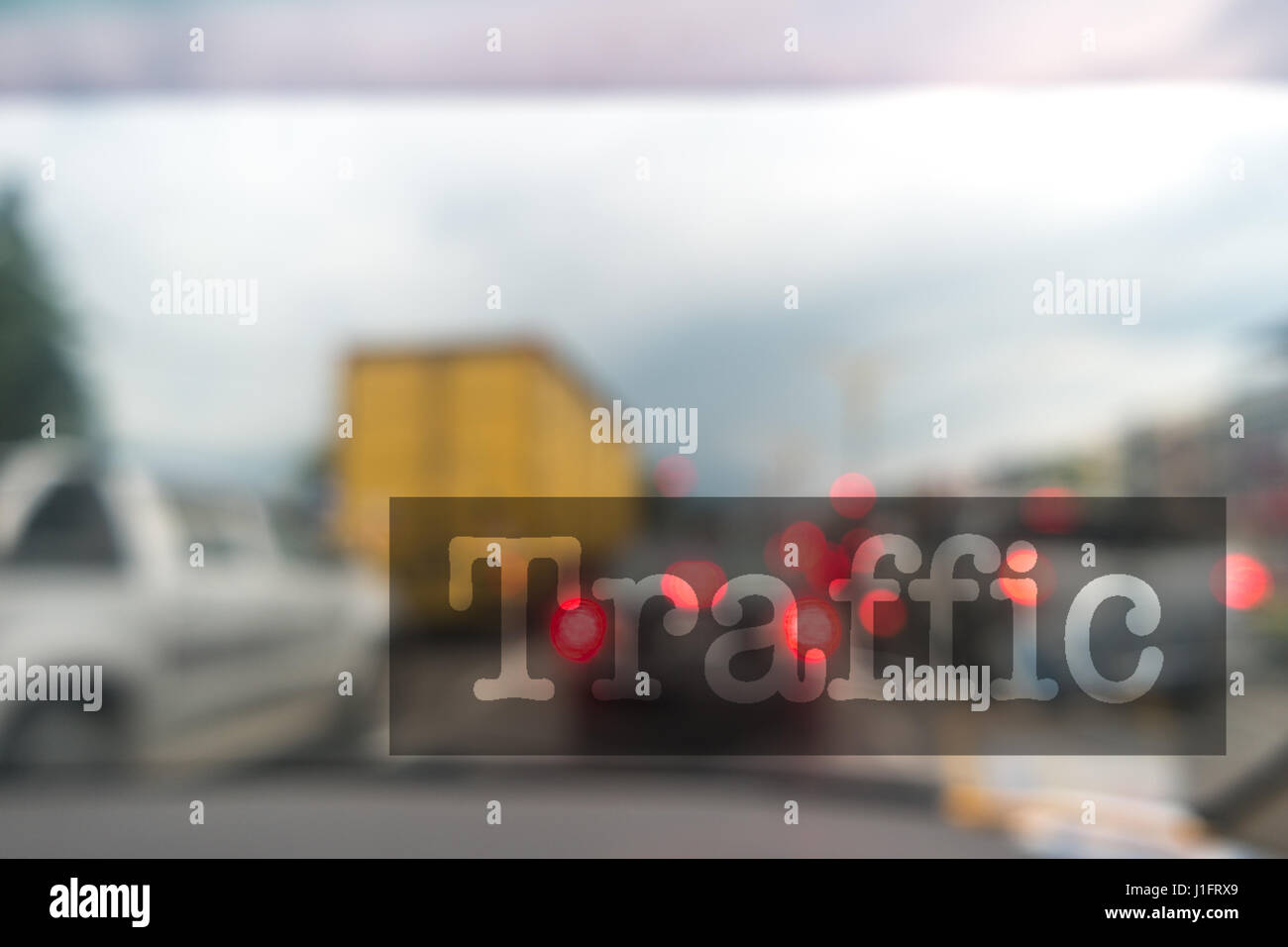 Traffic text with blurred background Stock Photo - Alamy