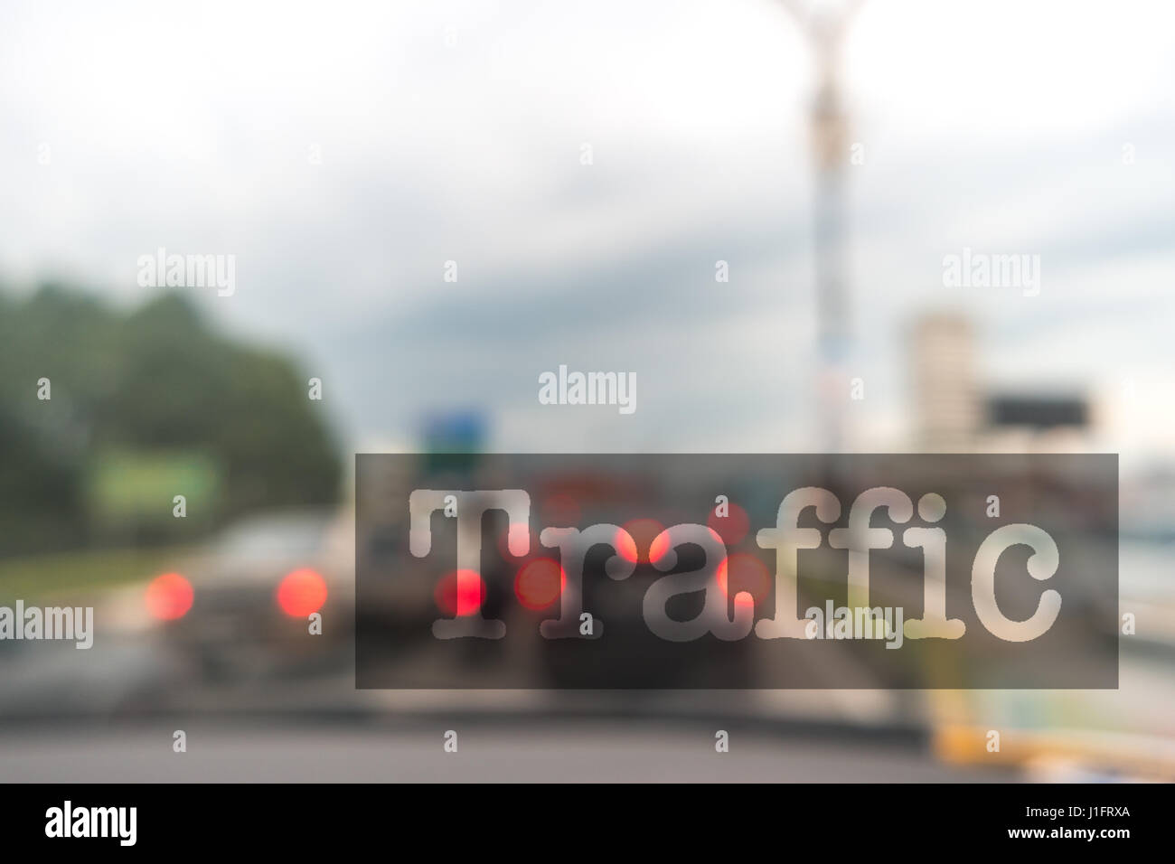 Traffic text with blurred background Stock Photo - Alamy