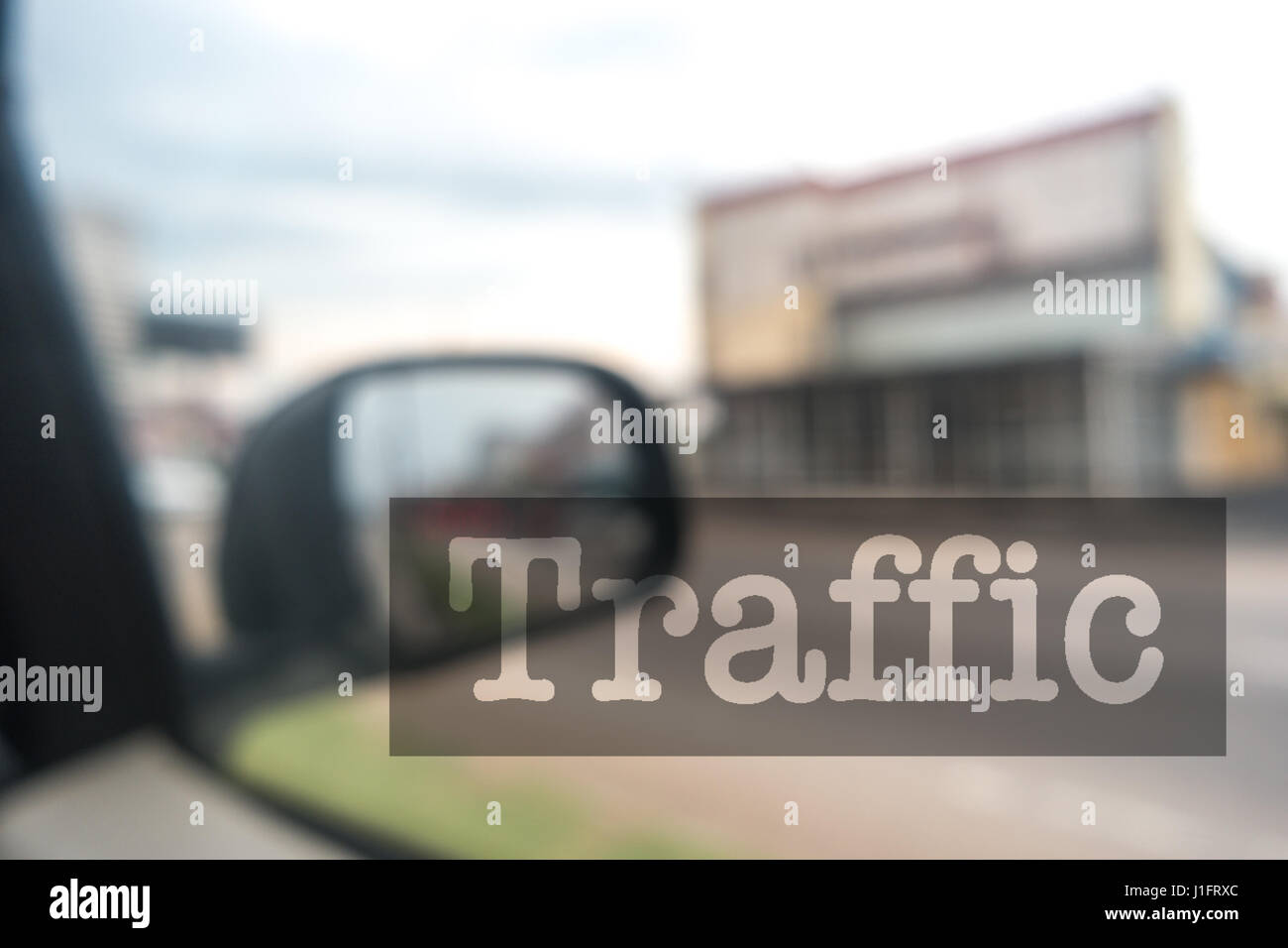 Traffic text with blurred background Stock Photo - Alamy