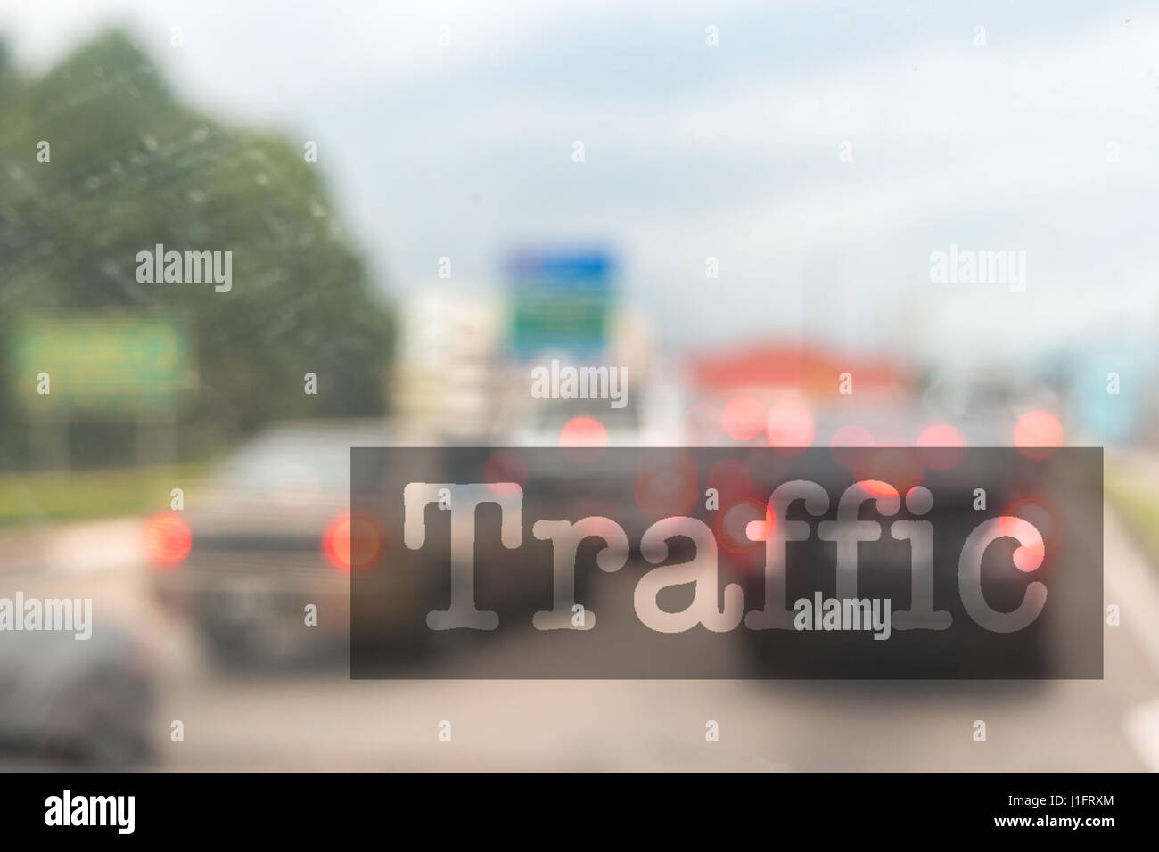 Traffic text with blurred background Stock Photo - Alamy