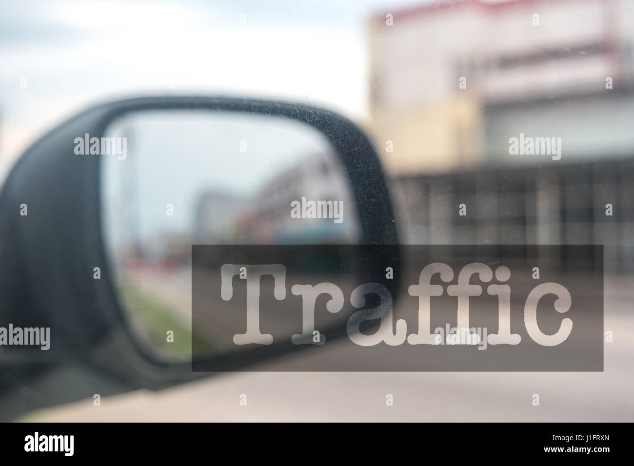 Traffic text with blurred background Stock Photo - Alamy