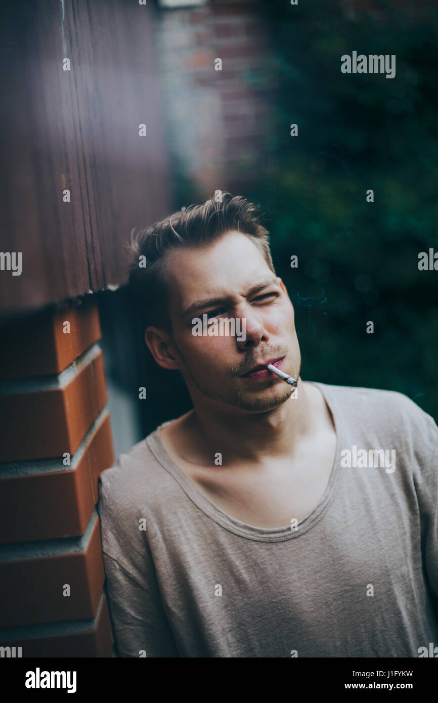Cool guy smoking hi-res stock photography and images - Alamy