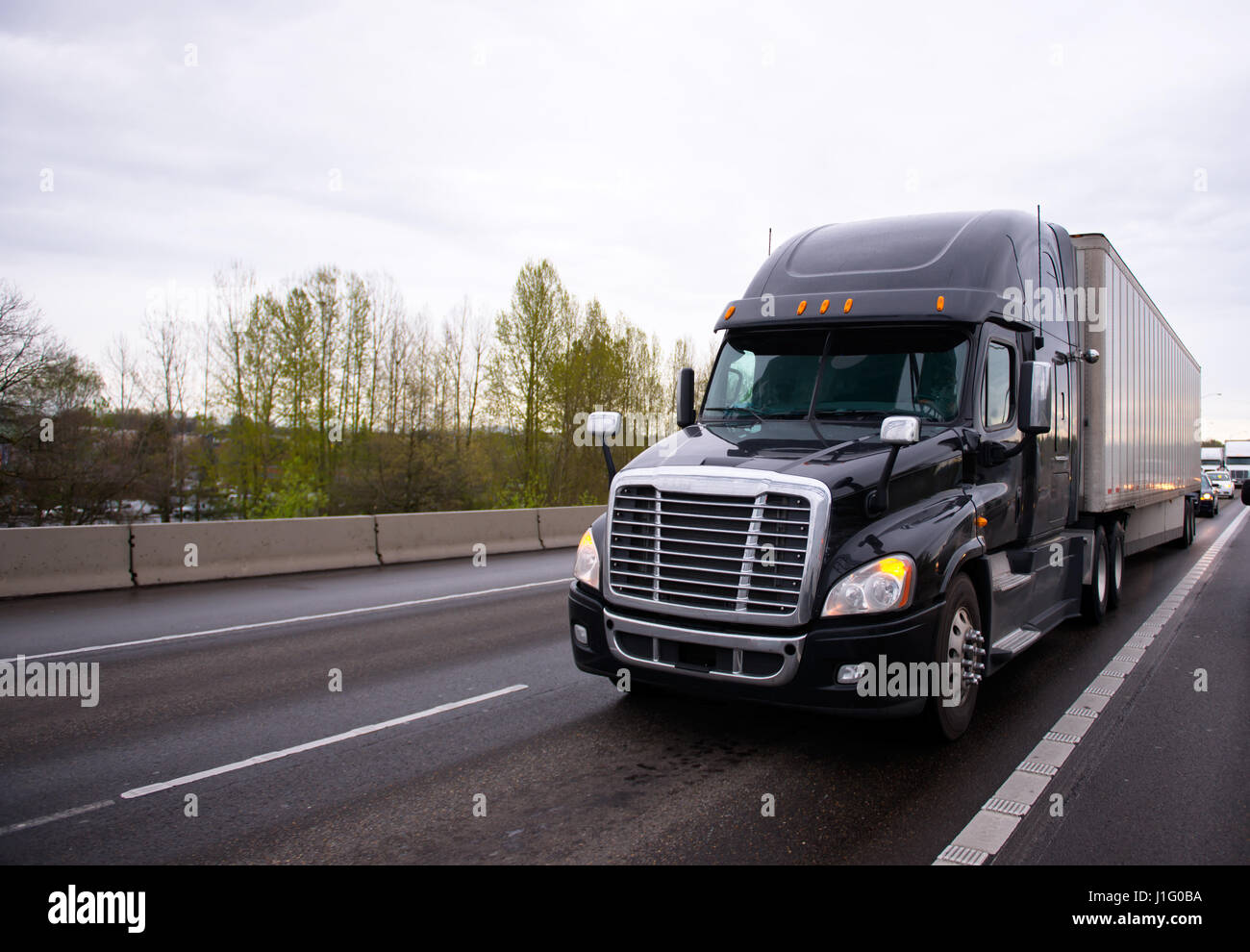 Black modern semi truck - it is always stylish and emphasizes excellent ...