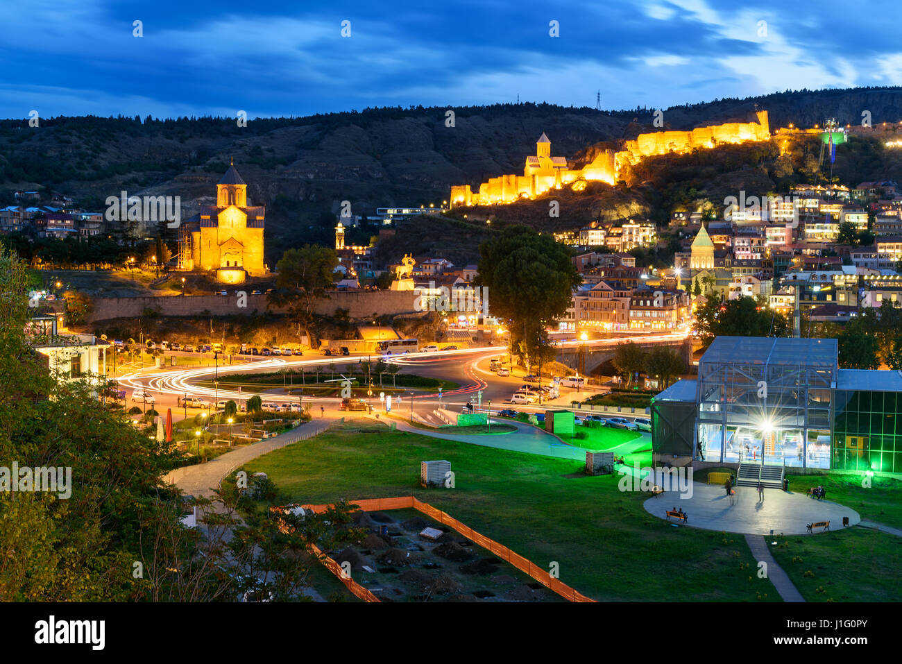 View of night city. Rike Park , Old city, Metekhi bridge and church and ...