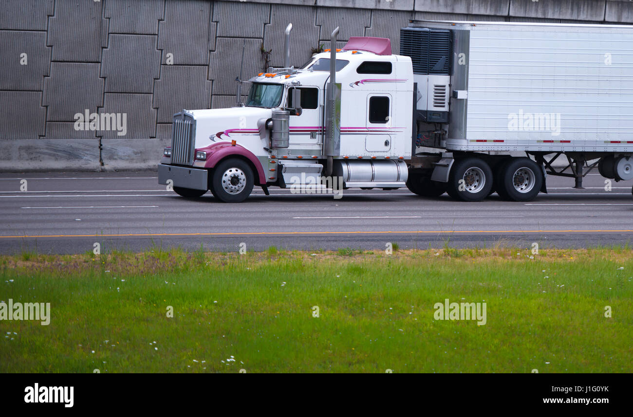 Classic big rig semi truck with color accents on fenders and spoiler ...