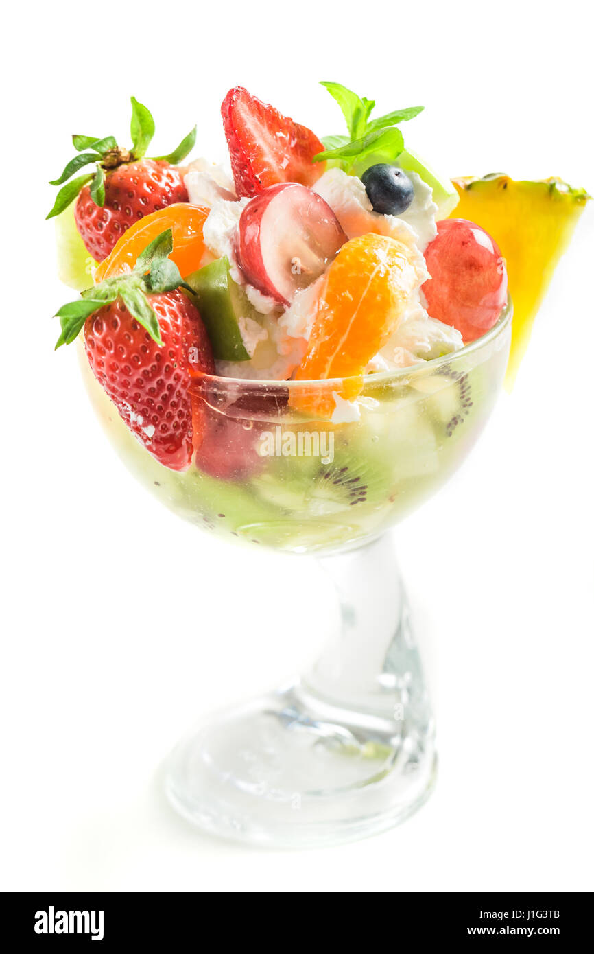 Desert made of fresh and sweet fruit on white background Stock Photo ...