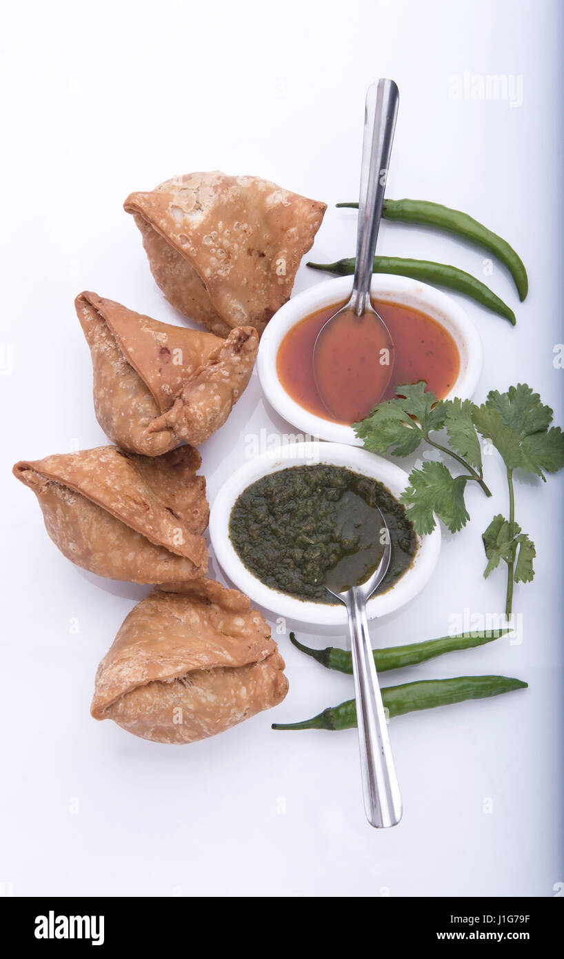Samosa green background hi-res stock photography and images - Alamy