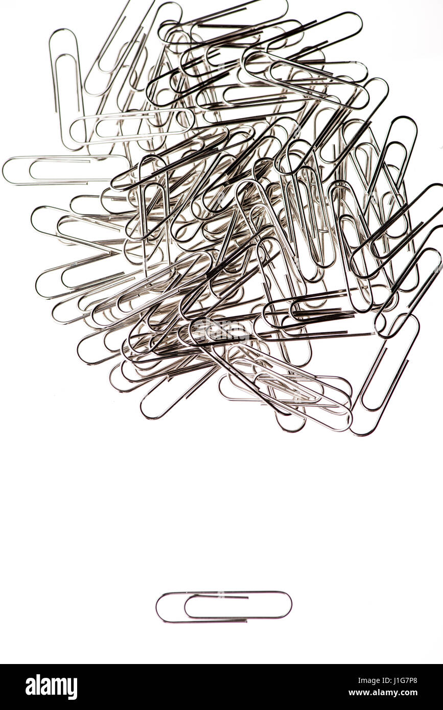 Close-up view of pile of paper clips on white background Stock Photo ...