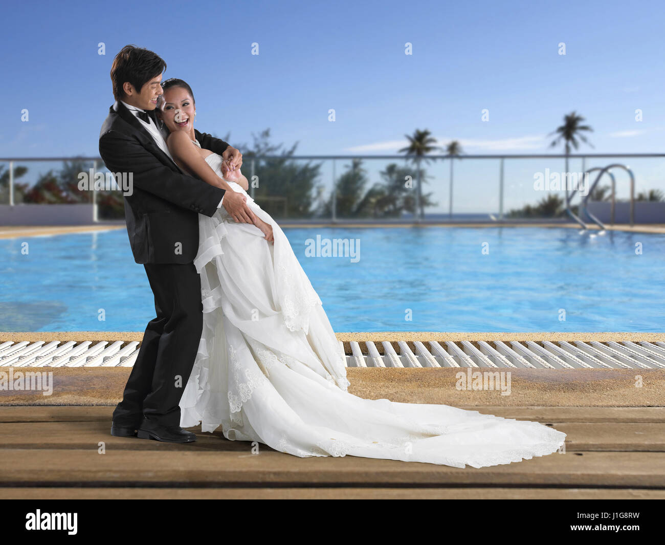 Poolside wedding hi-res stock photography and images - Alamy