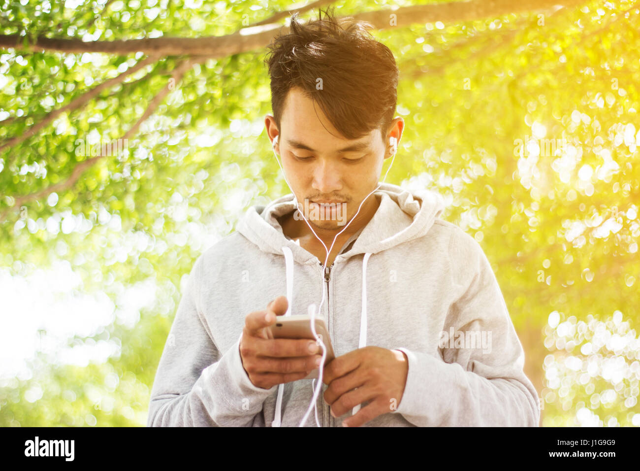 Man using smartphones Stock Photo - Alamy