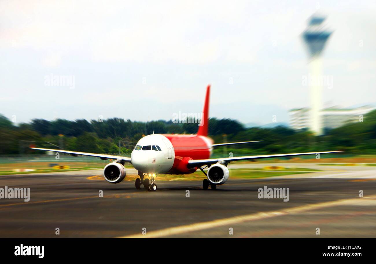 Air plane on runway ready for take-off Stock Photo - Alamy