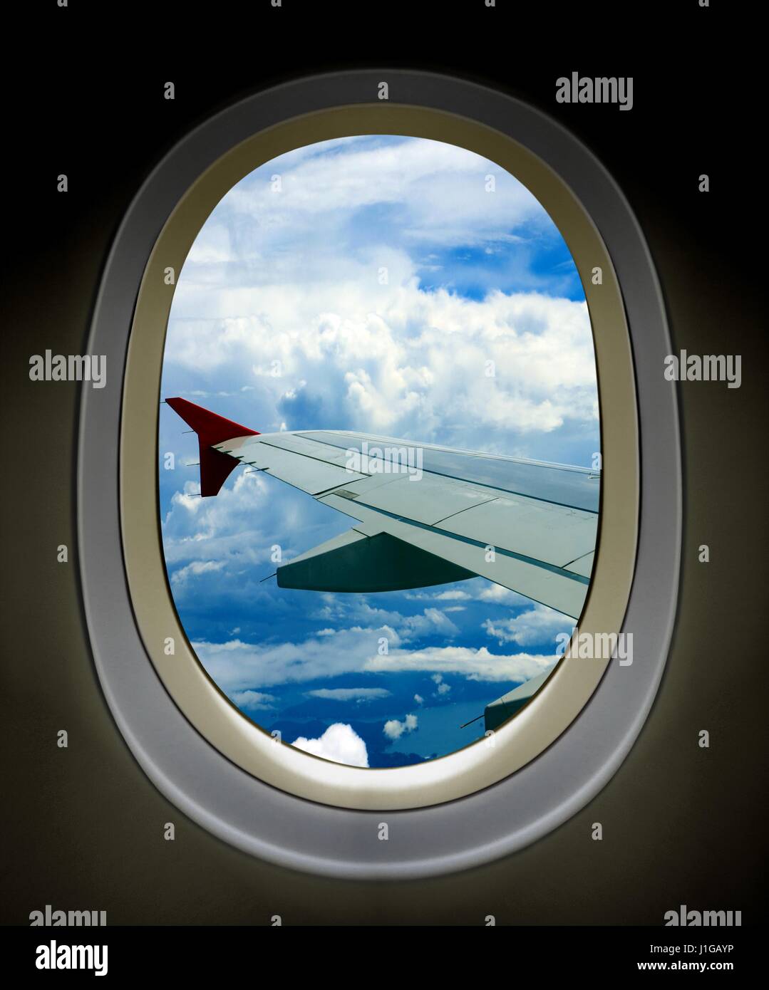 Airplane wing view from window seats Stock Photo - Alamy