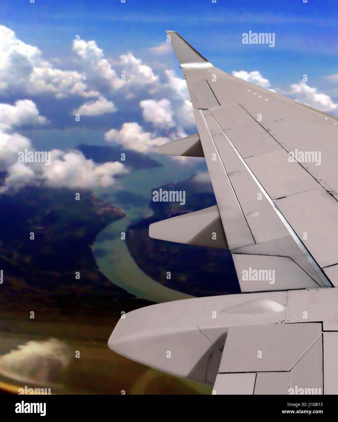Airplane wing view Stock Photo - Alamy