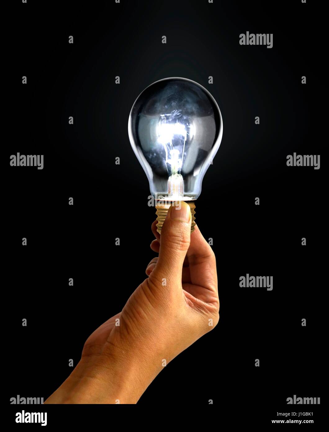 Hand Holding Light Bulb Stock Photo - Alamy