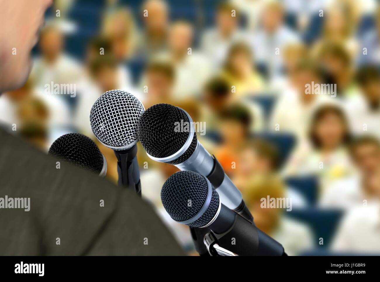Man giving speech during seminar Stock Photo - Alamy