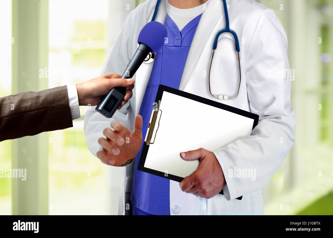 Medical doctor press interview hi-res stock photography and images - Alamy