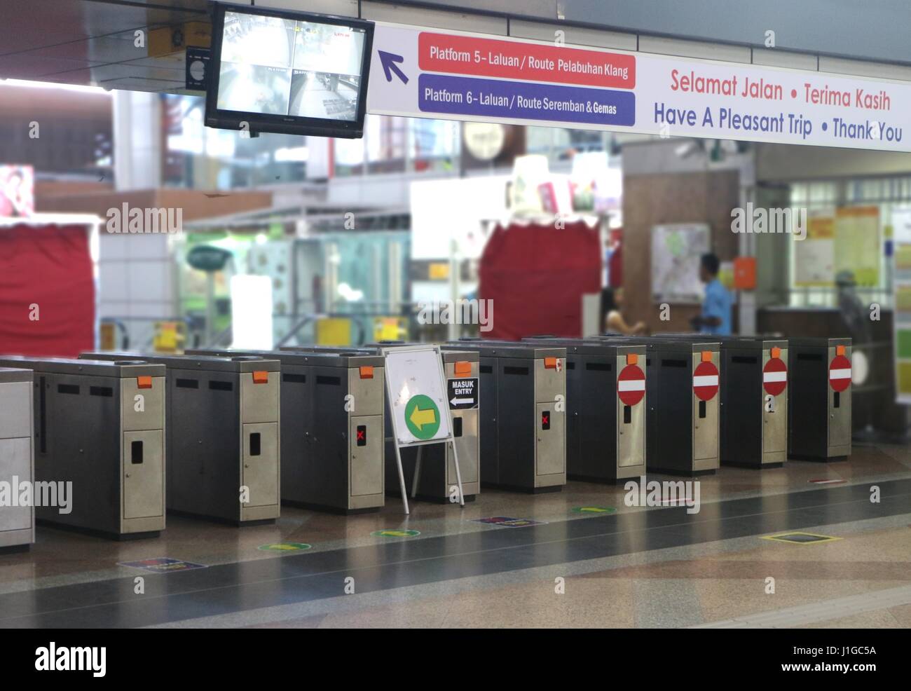 Rail station access gate Stock Photo - Alamy