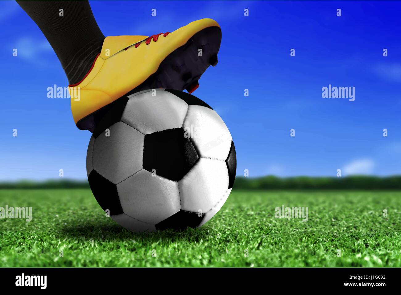 Soccer Boots on Ball Stock Photo - Alamy