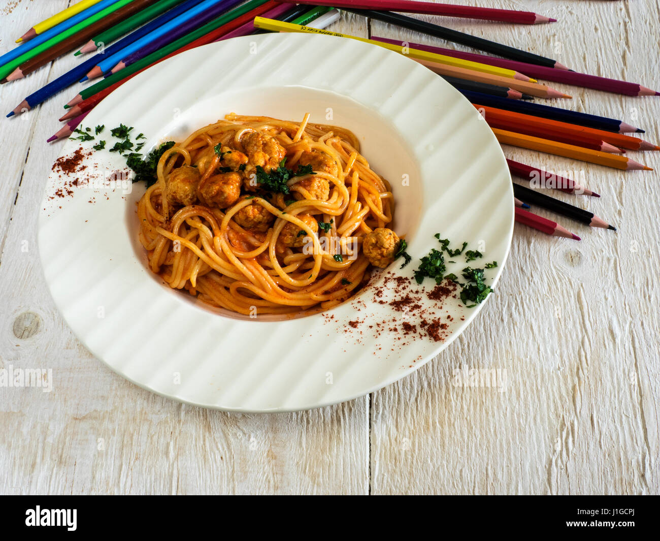 Children's menu: Spaghetti with chicken meatballs and tomato sauce ...