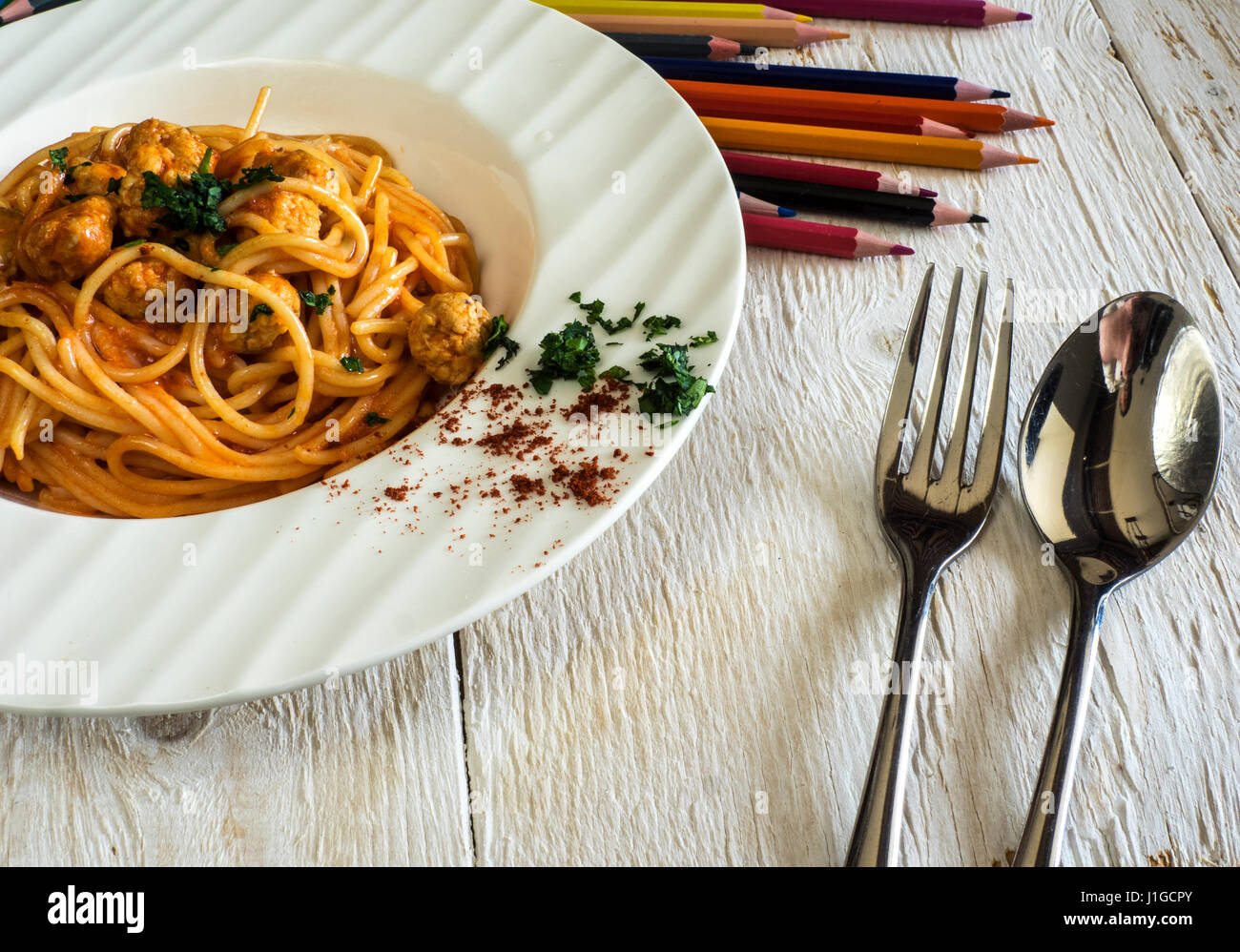 Children's menu: Spaghetti with chicken meatballs and tomato sauce ...