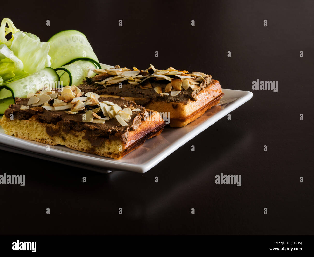 Liver pate on a Belgian waffle Stock Photo - Alamy