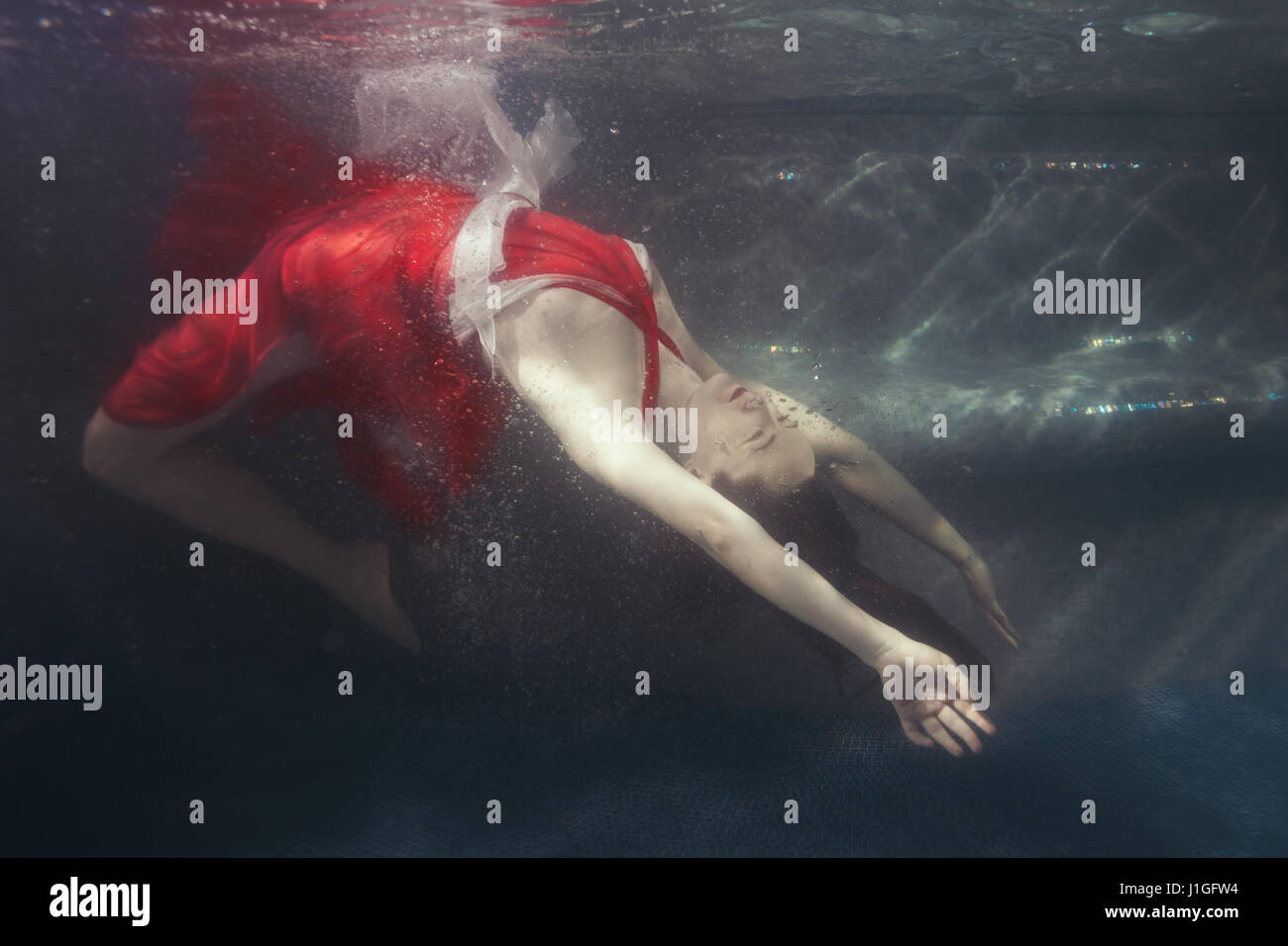 Woman diving into water splash hi-res stock photography and images - Alamy