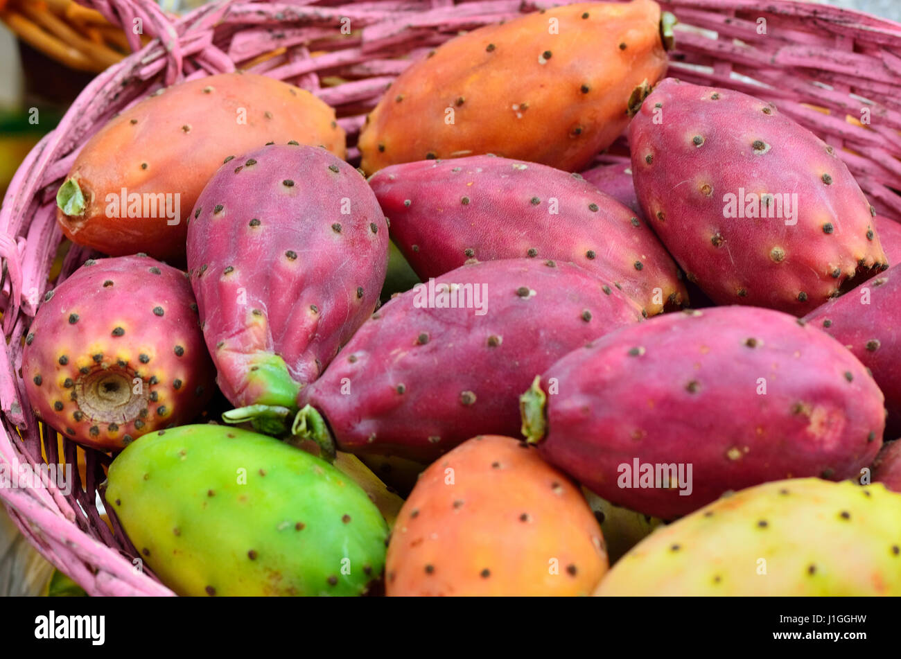 Colored prickly pear in a basket Stock Photo - Alamy