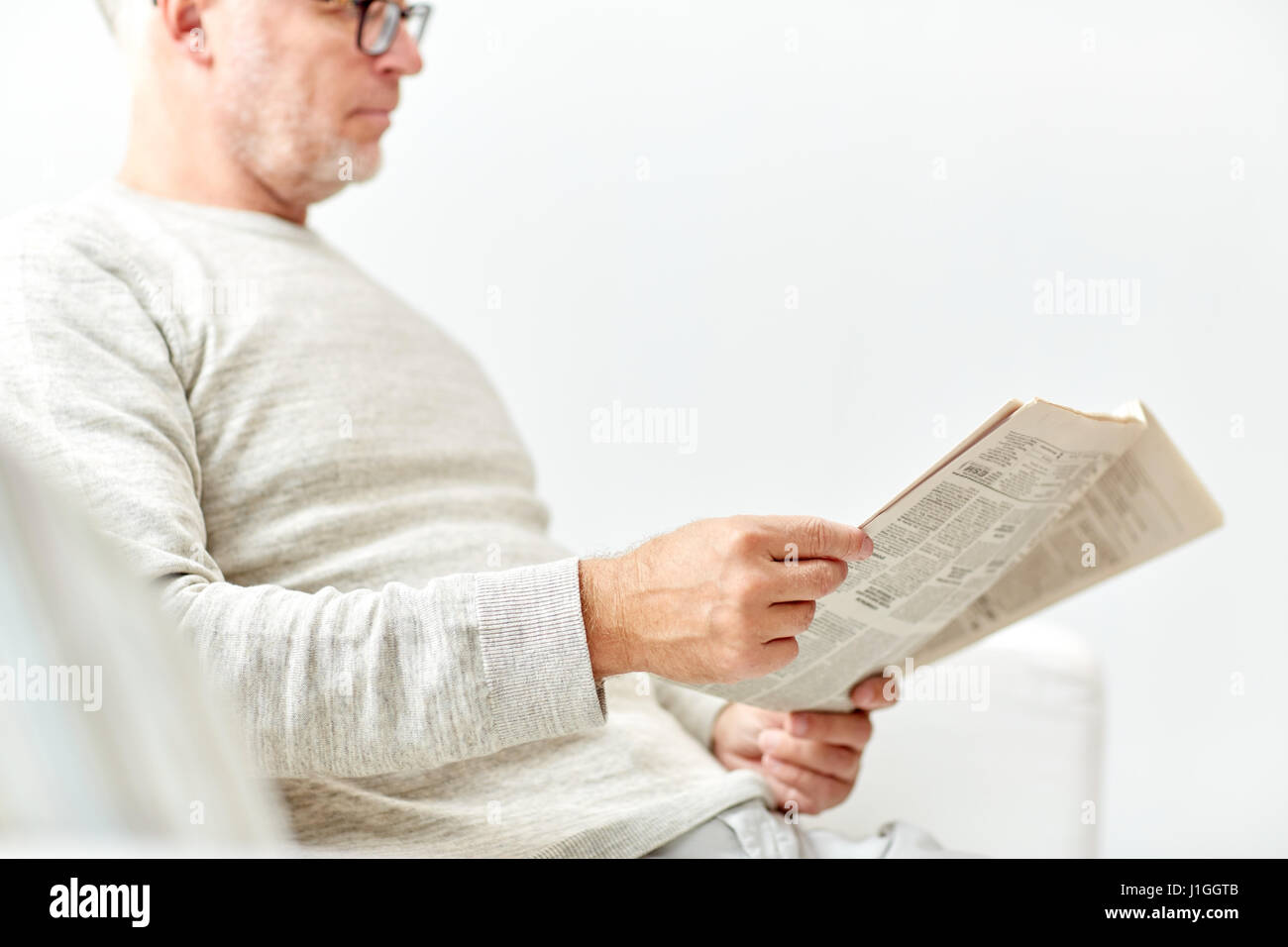 Close up man reading article hi-res stock photography and images - Alamy