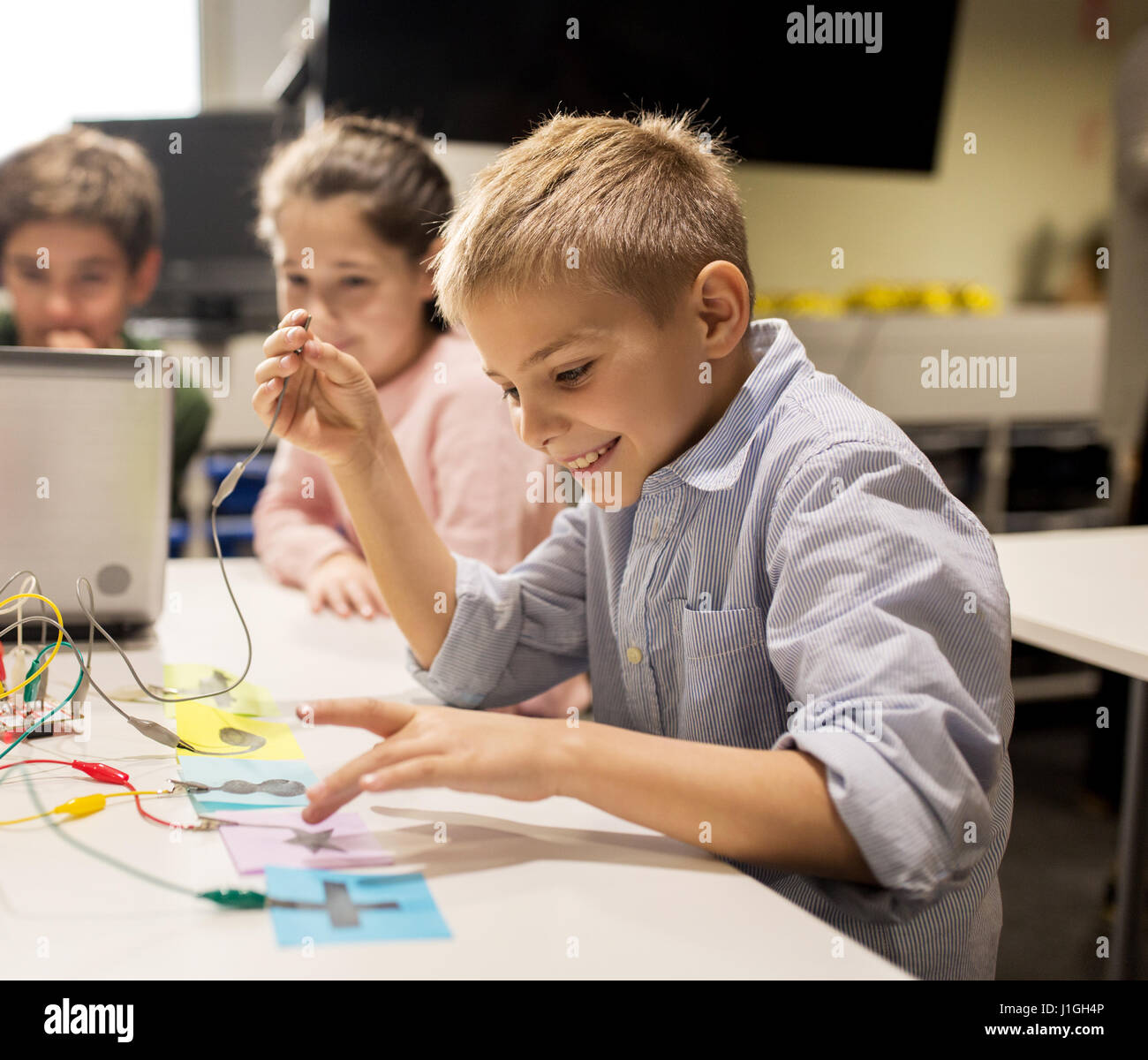 kids, laptop and invention kit at robotics school Stock Photo - Alamy
