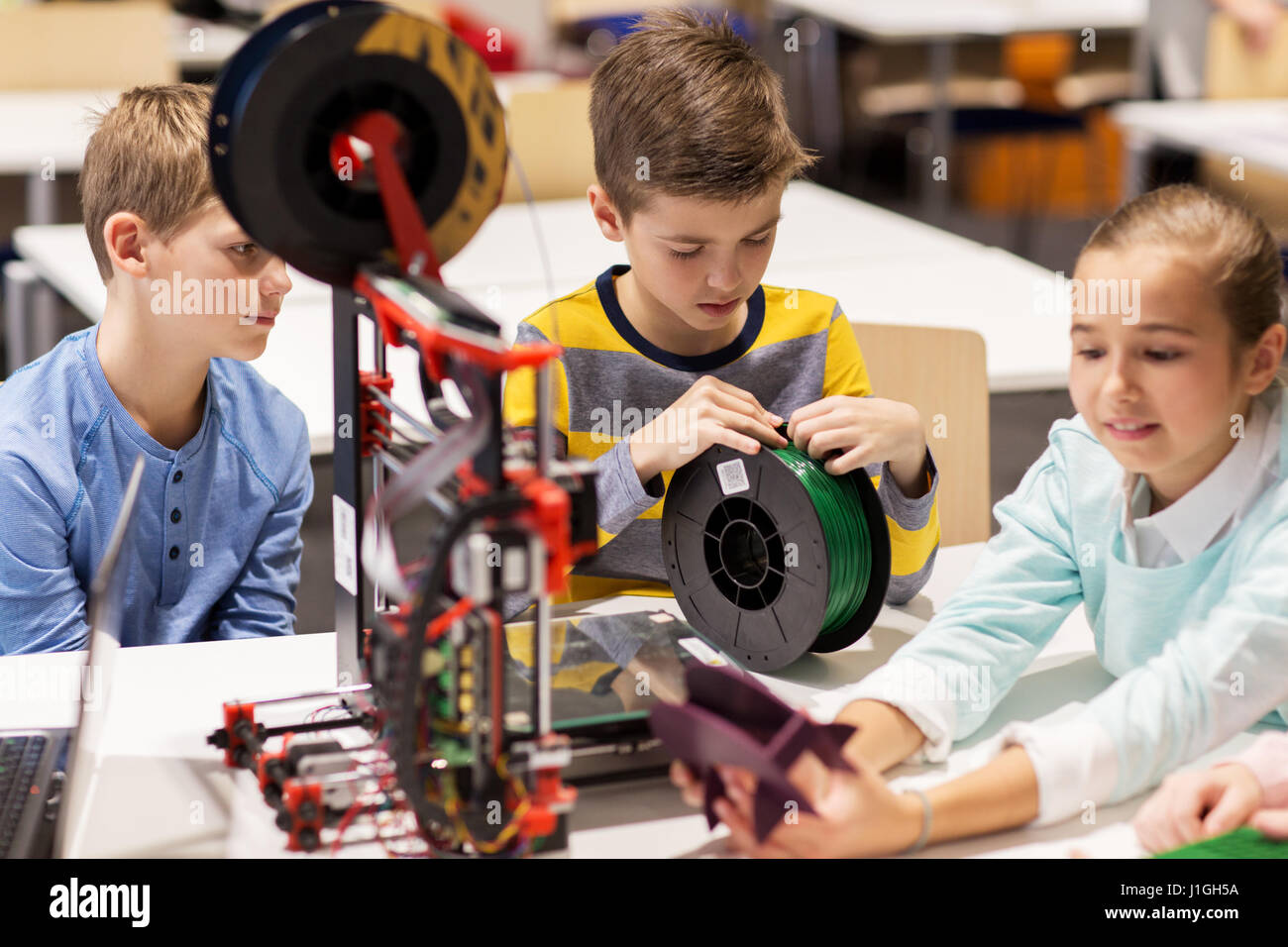 happy children with 3d printer at robotics school Stock Photo - Alamy