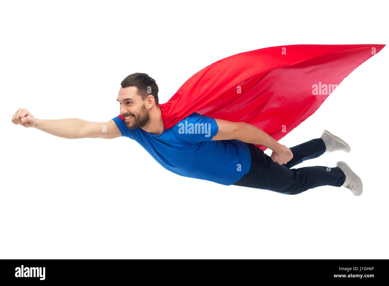 happy man in red superhero cape flying on air Stock Photo - Alamy