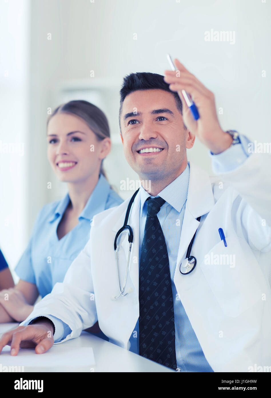 group of happy doctors on conference at hospital Stock Photo - Alamy