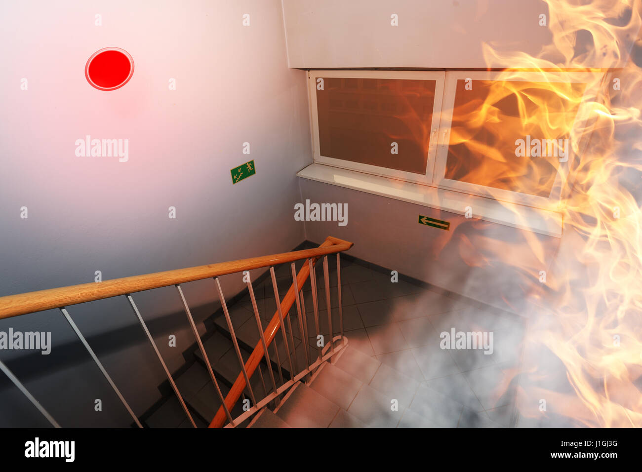 Building on fire - emergency exit Stock Photo - Alamy